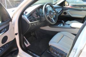 White BMW X5 2017 in Liepaja, with an engine capacity of 3.00 L and mileage of 164 thousand km for 29500 €, photo 8 on AUTOMOTO.COM.LV