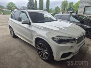 White BMW X5 2018 in Riga, with an engine capacity of 2.00 L and mileage of 179 thousand km for 24999 €, photo 15 on AUTOMOTO.COM.LV