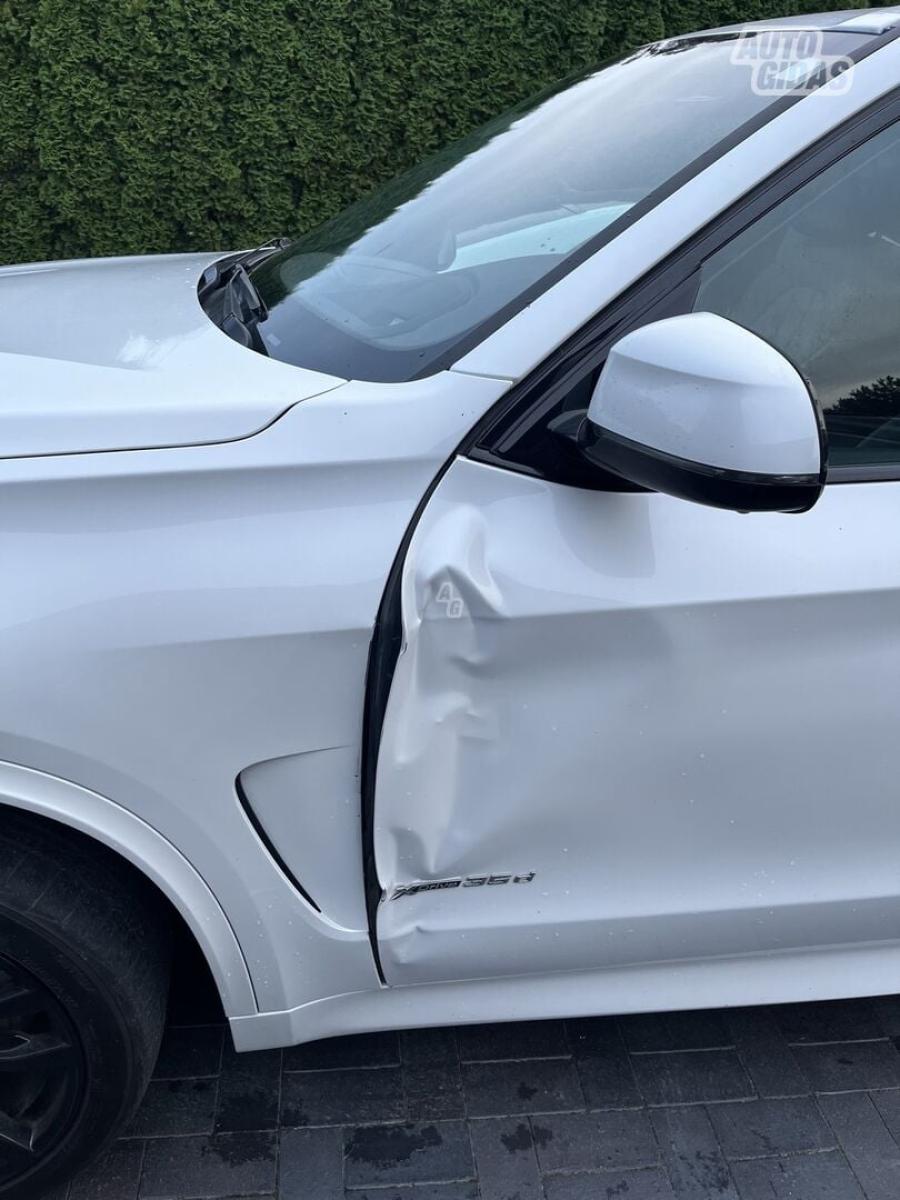 White BMW X5 2018 in Alytus, with an engine capacity of 3.00 L and mileage of 119 thousand km for 18700 €, photo 14 on AUTOMOTO.COM.LV