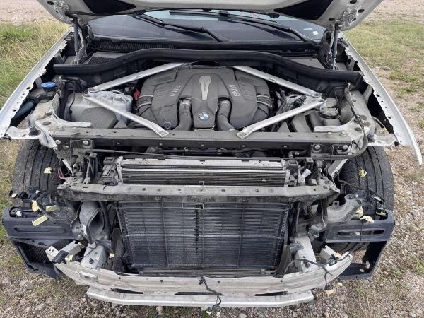 White BMW X5 2019 in Vilnius, with an engine capacity of 4.40 L and mileage of 178 thousand km for 24500 €, photo 9 on AUTOMOTO.COM.LV