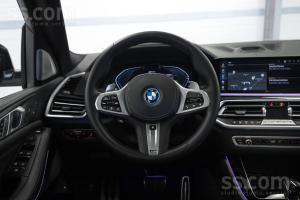 White BMW X5 2022 in Tukums, with an engine capacity of 3.00 L and mileage of 0 thousand km for 55777 €, photo 19 on AUTOMOTO.COM.LV