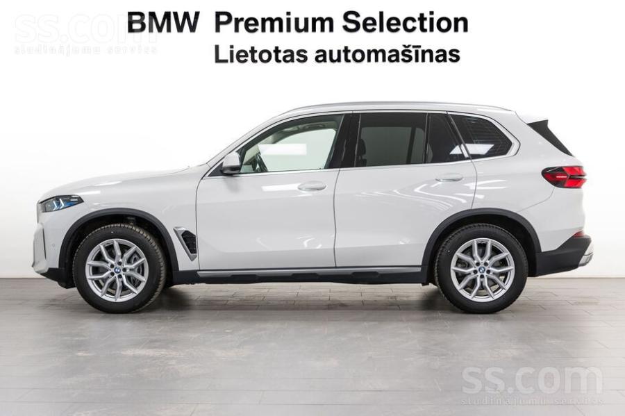 White BMW X5 2023 in Riga, with an engine capacity of 3.00 L and mileage of 77 thousand km for 59900 €, photo 8 on AUTOMOTO.COM.LV
