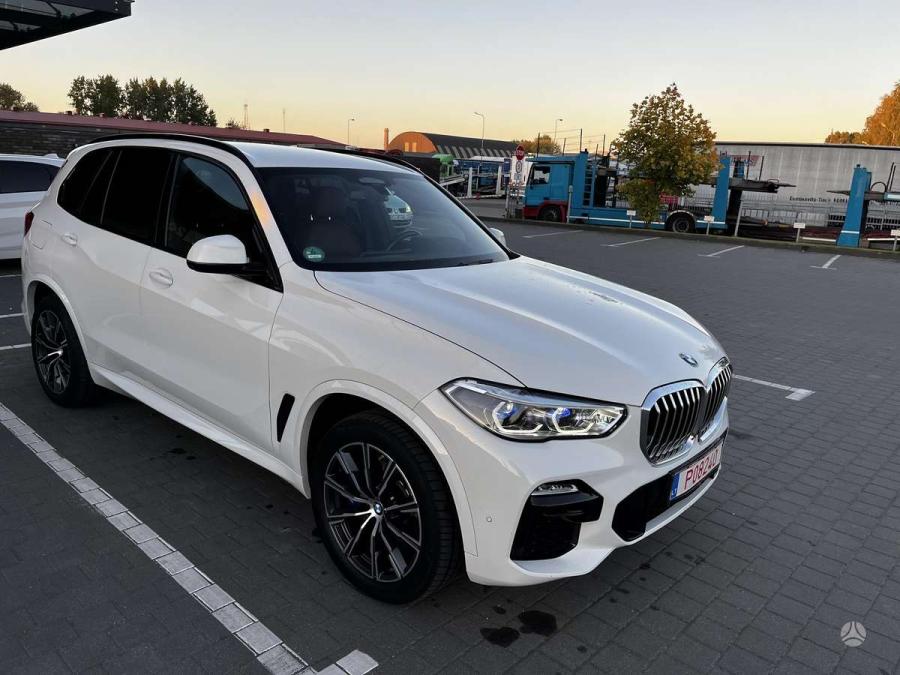 White BMW X5 2023 in Marijampole, with an engine capacity of 2.99 L and mileage of 76 thousand km for 45500 €, photo 7 on AUTOMOTO.COM.LV