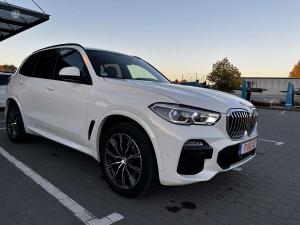 White BMW X5 2023 in Marijampole, with an engine capacity of 2.99 L and mileage of 76 thousand km for 45500 €, photo 8 on AUTOMOTO.COM.LV