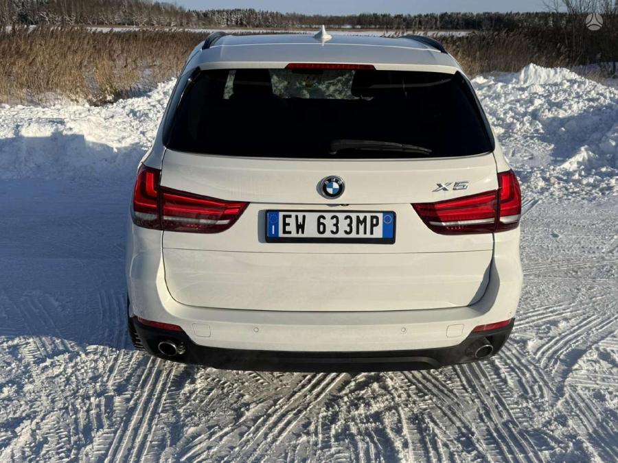 White BMW X5 2014 in Siauliai, with an engine capacity of 2.00 L and mileage of 232 thousand km for 17950 €, photo 8 on AUTOMOTO.COM.LV
