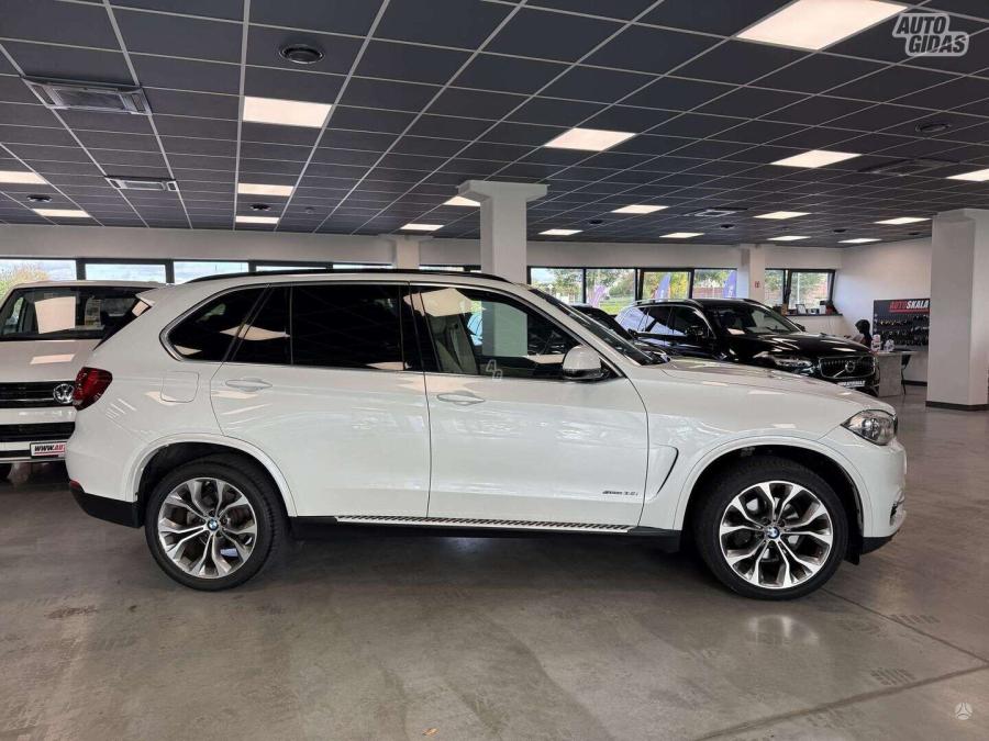 White BMW X5 2015 in Klaipeda, with an engine capacity of 3.00 L and mileage of 145 thousand km for 19500 €, photo 20 on AUTOMOTO.COM.LV