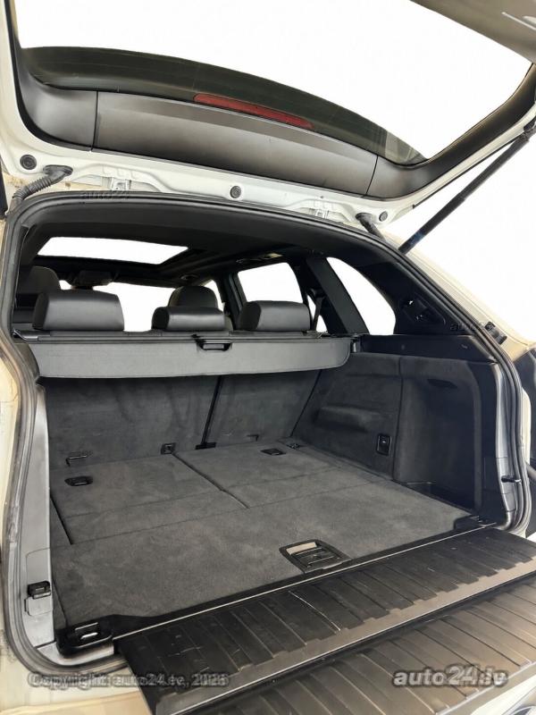 White BMW X5 2012 in Tallinn, with an engine capacity of 3.00 L and mileage of 380 thousand km for 14900 €, photo 10 on AUTOMOTO.COM.LV