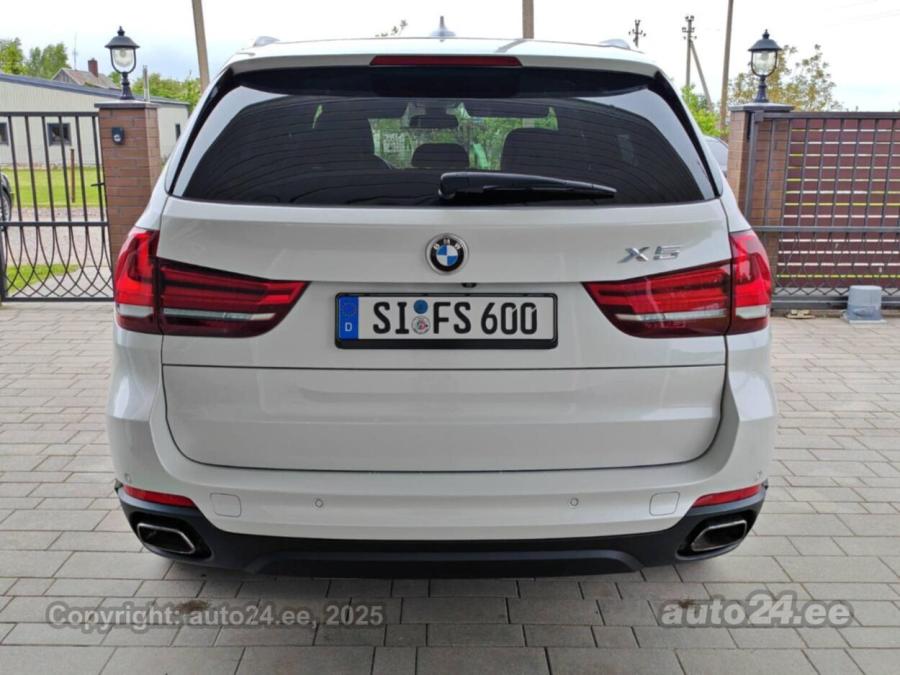 White BMW X5 2014 in Johvi, with an engine capacity of 3.00 L and mileage of 337 thousand km for 21999 €, photo 4 on AUTOMOTO.COM.LV