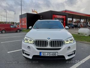 White BMW X5 2014 in Johvi, with an engine capacity of 3.00 L and mileage of 337 thousand km for 21999 €, photo 8 on AUTOMOTO.COM.LV