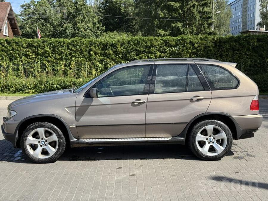 Yellow BMW X5 2005 in Riga, with an engine capacity of 4.40 L and mileage of 310 thousand km for 3700 €, photo 9 on AUTOMOTO.COM.LV