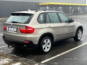 Yellow BMW X5 2008 in Tartu, with an engine capacity of 3.00 L and mileage of 283 thousand km for 7999 €, photo 3 on AUTOMOTO.COM.LV