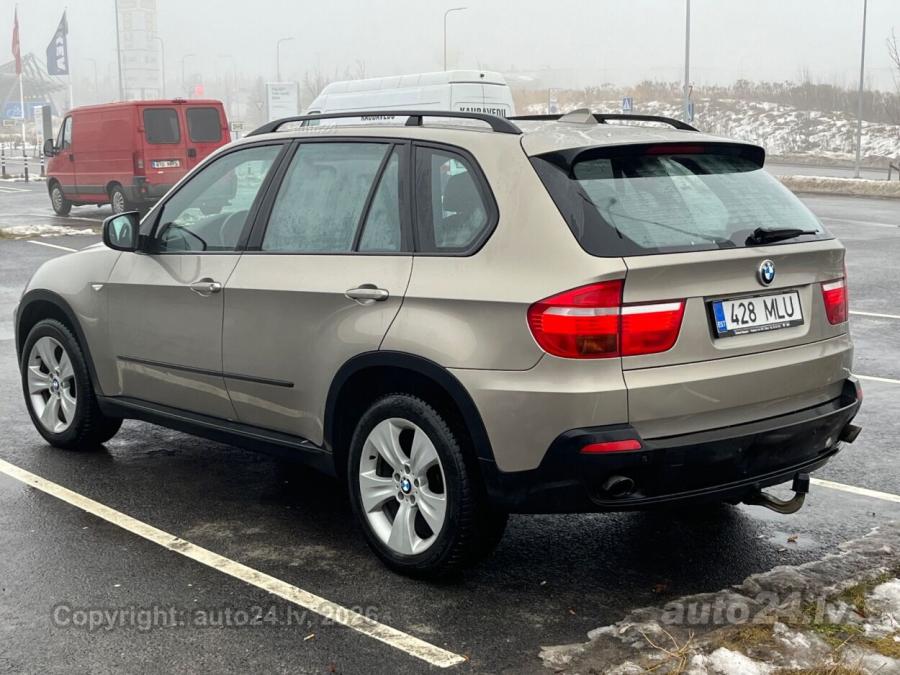 Yellow BMW X5 2008 in Tartu, with an engine capacity of 3.00 L and mileage of 283 thousand km for 7999 €, photo 4 on AUTOMOTO.COM.LV