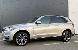 Yellow BMW X5 2014 in Vilnius, with an engine capacity of 2.99 L and mileage of 173 thousand km for 21200 €, photo 4 on AUTOMOTO.COM.LV
