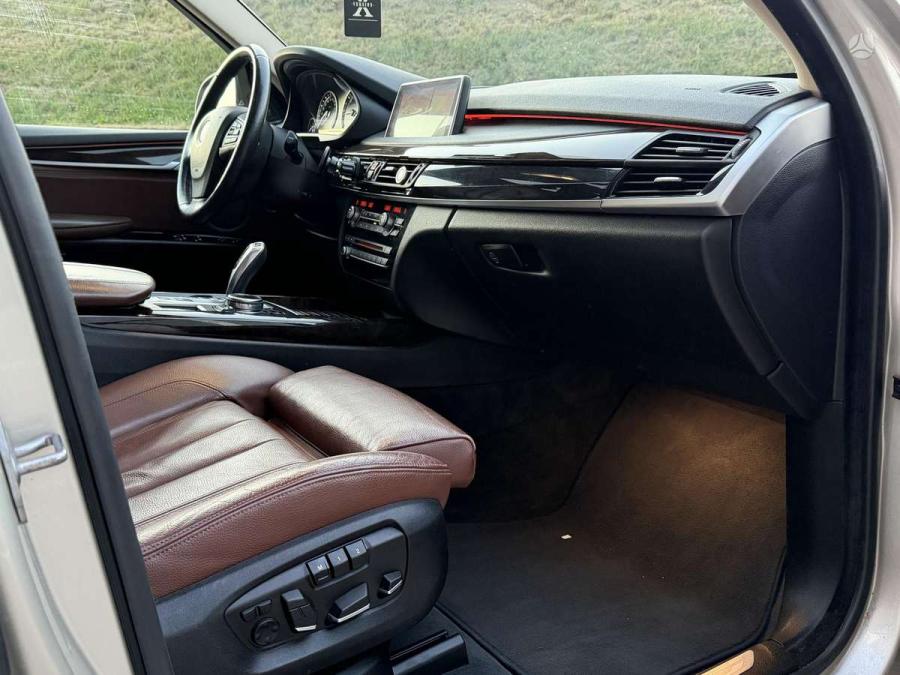 Yellow BMW X5 2014 in Vilnius, with an engine capacity of 2.99 L and mileage of 173 thousand km for 21200 €, photo 12 on AUTOMOTO.COM.LV