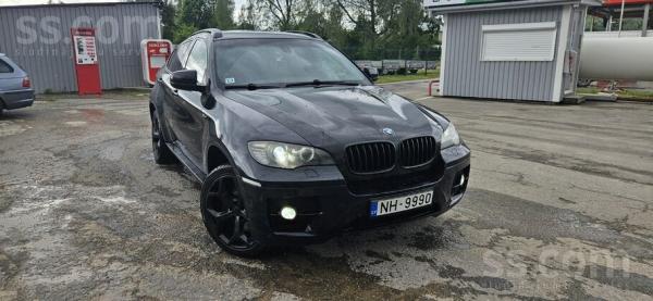 Black BMW X6 2008 in Cesis, with an engine capacity of 3.00 L and mileage of 444 thousand km for 29400 €, photo 1 on AUTOMOTO.COM.LV