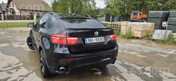 Black BMW X6 2008 in Cesis, with an engine capacity of 3.00 L and mileage of 444 thousand km for 29400 €, photo 3 on AUTOMOTO.COM.LV
