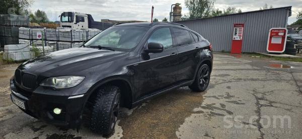 Black BMW X6 2008 in Cesis, with an engine capacity of 3.00 L and mileage of 444 thousand km for 29400 €, photo 5 on AUTOMOTO.COM.LV