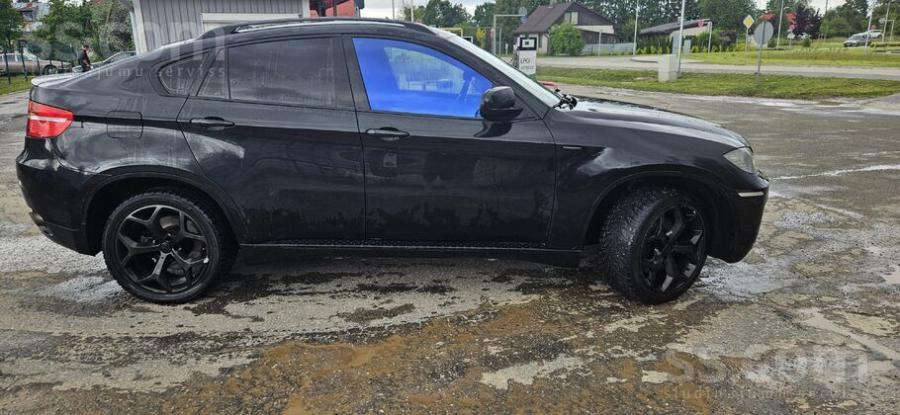 Black BMW X6 2008 in Cesis, with an engine capacity of 3.00 L and mileage of 444 thousand km for 25000 €, photo 19 on AUTOMOTO.COM.LV