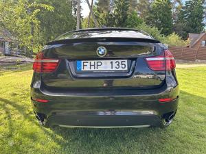 Black BMW X6 2010 in Utena, with an engine capacity of 2.99 L and mileage of 281 thousand km for 11999 €, photo 6 on AUTOMOTO.COM.LV