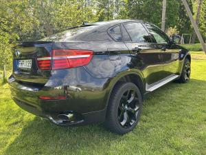 Black BMW X6 2010 in Utena, with an engine capacity of 2.99 L and mileage of 281 thousand km for 11999 €, photo 7 on AUTOMOTO.COM.LV