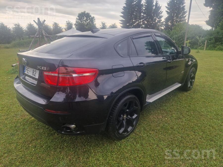 Black BMW X6 2012 in Ogre, with an engine capacity of 3.00 L and mileage of 350 thousand km for 12000 €, photo 4 on AUTOMOTO.COM.LV