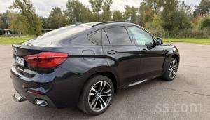 Melns BMW X6 2014 Rīga, ar dzinēja tilpumu 3.00 L un nobraukumu 218 tūkst. km par 22750 €, foto  vietnē AUTOMOTO.COM.LV