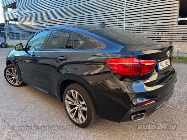 Black BMW X6 2018 in Tallinn, with an engine capacity of 3.00 L and mileage of 185 thousand km for 35000 €, photo 4 on AUTOMOTO.COM.LV
