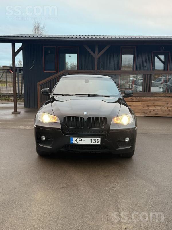 Black BMW X6 2008 in Riga, with an engine capacity of 3.00 L and mileage of 0 thousand km for 11500 €, photo 2 on AUTOMOTO.COM.LV