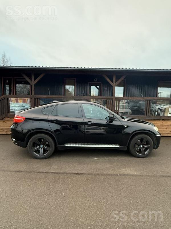 Black BMW X6 2008 in Riga, with an engine capacity of 3.00 L and mileage of 0 thousand km for 11500 €, photo 6 on AUTOMOTO.COM.LV