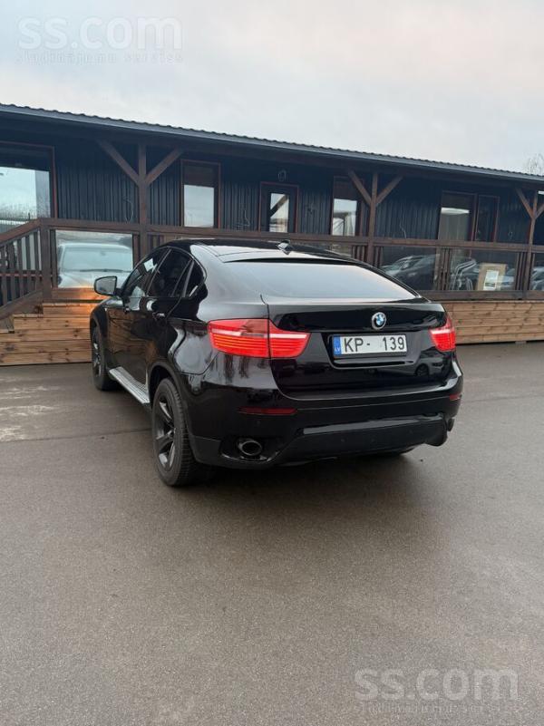 Black BMW X6 2008 in Riga, with an engine capacity of 3.00 L and mileage of 0 thousand km for 11500 €, photo 8 on AUTOMOTO.COM.LV