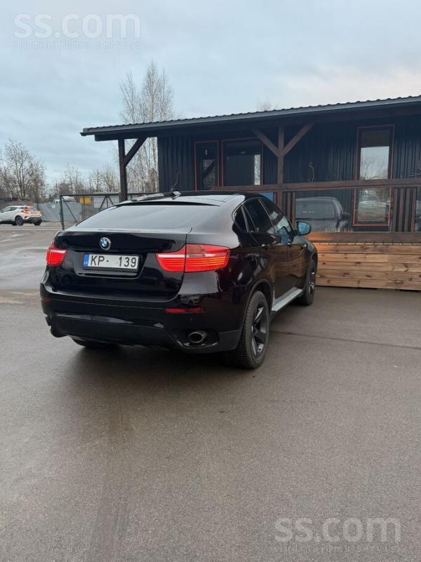 Black BMW X6 2008 in Riga, with an engine capacity of 3.00 L and mileage of 0 thousand km for 11500 €, photo 9 on AUTOMOTO.COM.LV