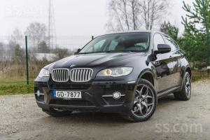 Black BMW X6 2008 in Riga, with an engine capacity of 3.00 L and mileage of 388 thousand km for 10790 €, photo  on AUTOMOTO.COM.LV
