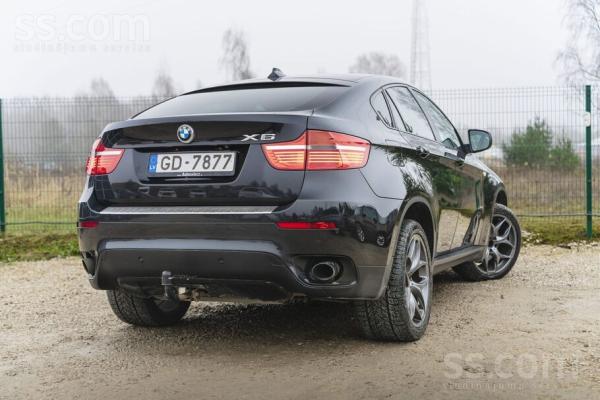 Black BMW X6 2008 in Riga, with an engine capacity of 3.00 L and mileage of 388 thousand km for 10790 €, photo 6 on AUTOMOTO.COM.LV