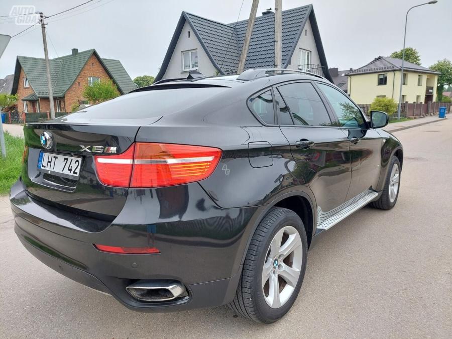 Black BMW X6 2008 in Alytus, with an engine capacity of 5.00 L and mileage of 210 thousand km for 6600 €, photo 7 on AUTOMOTO.COM.LV