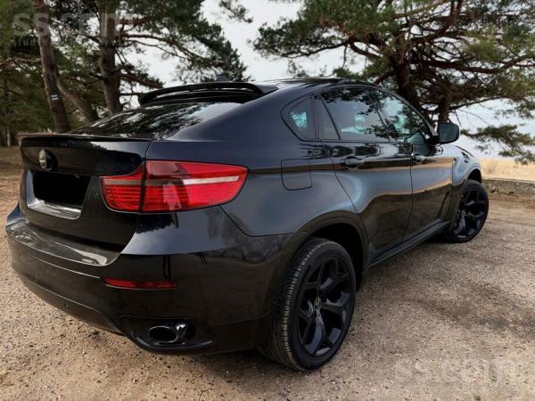 Black BMW X6 2008 in Riga, with an engine capacity of 3.00 L and mileage of 245 thousand km for 13700 €, photo 1 on AUTOMOTO.COM.LV