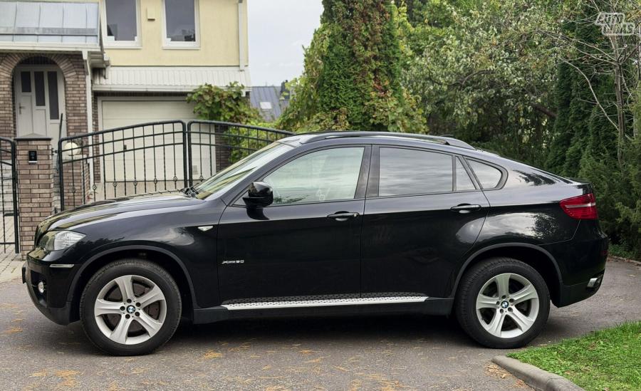 Black BMW X6 2008 in Vilnius, with an engine capacity of 4.40 L and mileage of 208 thousand km for 6999 €, photo 3 on AUTOMOTO.COM.LV