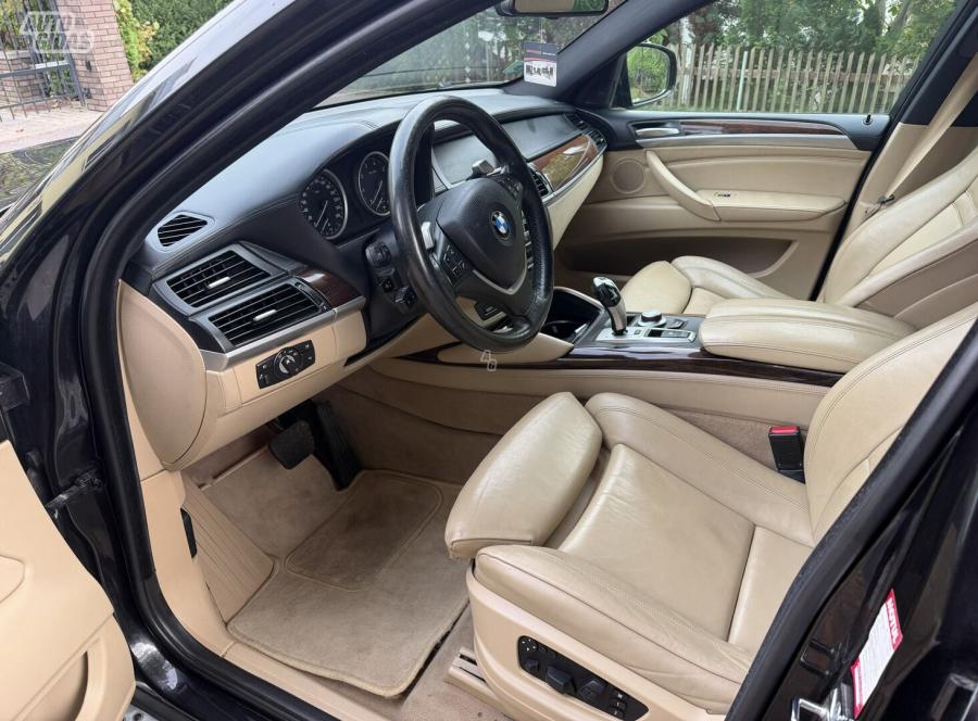 Black BMW X6 2008 in Vilnius, with an engine capacity of 4.40 L and mileage of 208 thousand km for 6999 €, photo 8 on AUTOMOTO.COM.LV
