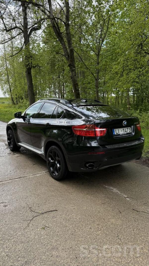 Black BMW X6 2009 in Riga, with an engine capacity of 3.00 L and mileage of 302 thousand km for 8200 €, photo 4 on AUTOMOTO.COM.LV