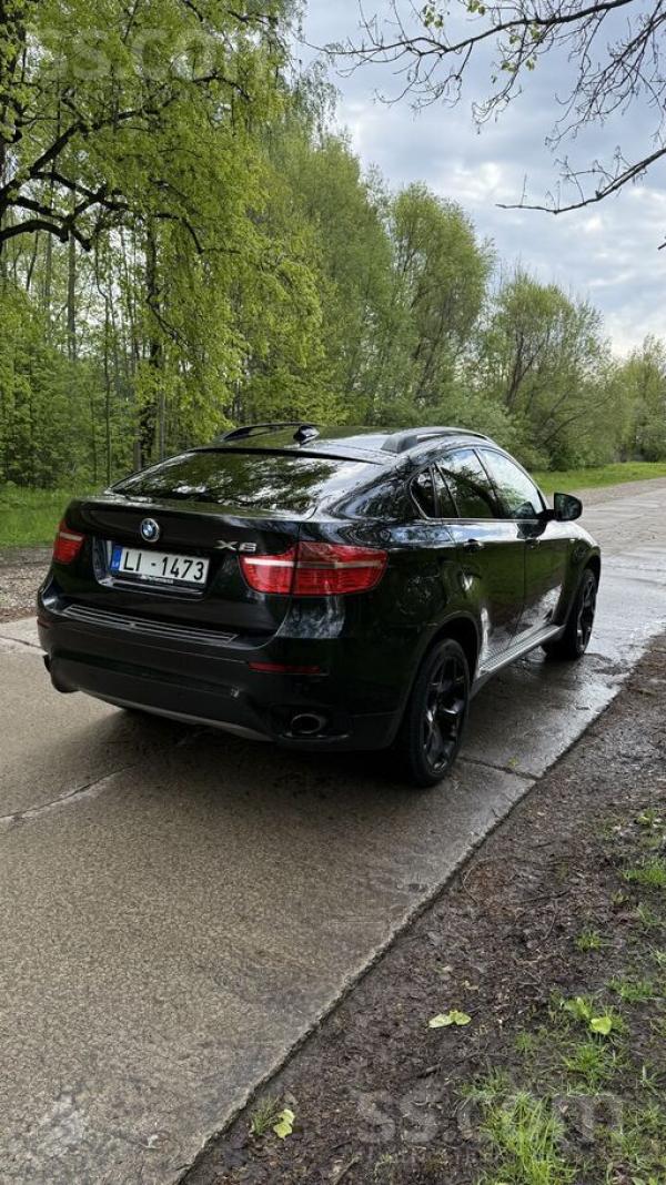 Black BMW X6 2009 in Riga, with an engine capacity of 3.00 L and mileage of 302 thousand km for 8200 €, photo 5 on AUTOMOTO.COM.LV