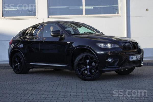 Black BMW X6 2009 in Riga, with an engine capacity of 3.00 L and mileage of 0 thousand km for 10995 €, photo 4 on AUTOMOTO.COM.LV