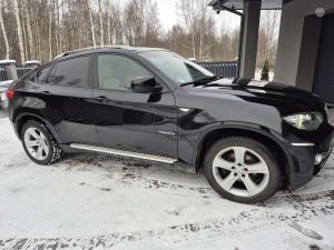 Black BMW X6 2009 in Siauliai, with an engine capacity of 3.00 L and mileage of 214 thousand km for 11800 €, photo 4 on AUTOMOTO.COM.LV