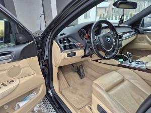 Black BMW X6 2009 in Siauliai, with an engine capacity of 3.00 L and mileage of 214 thousand km for 11800 €, photo 12 on AUTOMOTO.COM.LV