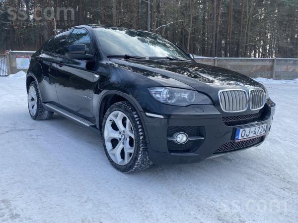 Black BMW X6 2009 in Riga, with an engine capacity of 3.00 L and mileage of 0 thousand km for 10900 €, photo 3 on AUTOMOTO.COM.LV