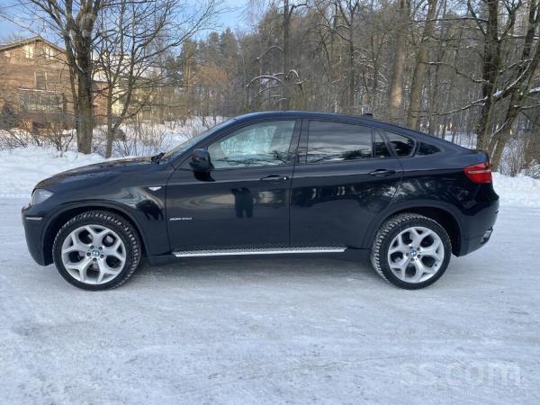 Black BMW X6 2009 in Riga, with an engine capacity of 3.00 L and mileage of 0 thousand km for 10900 €, photo 5 on AUTOMOTO.COM.LV