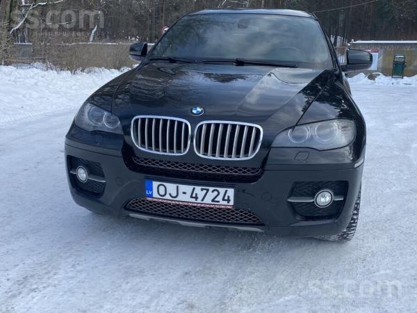 Black BMW X6 2009 in Riga, with an engine capacity of 3.00 L and mileage of 0 thousand km for 10900 €, photo 7 on AUTOMOTO.COM.LV