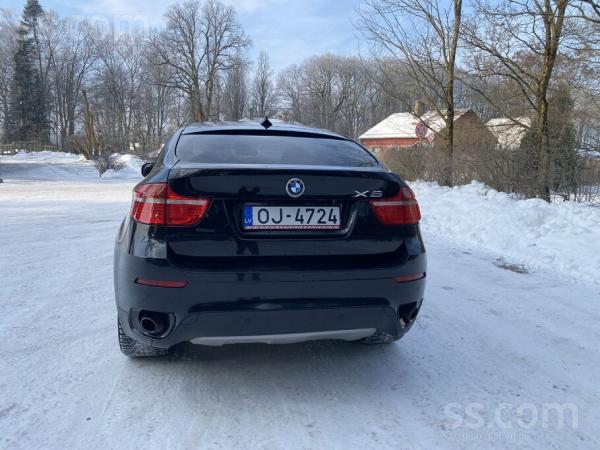 Black BMW X6 2009 in Riga, with an engine capacity of 3.00 L and mileage of 0 thousand km for 10900 €, photo 8 on AUTOMOTO.COM.LV