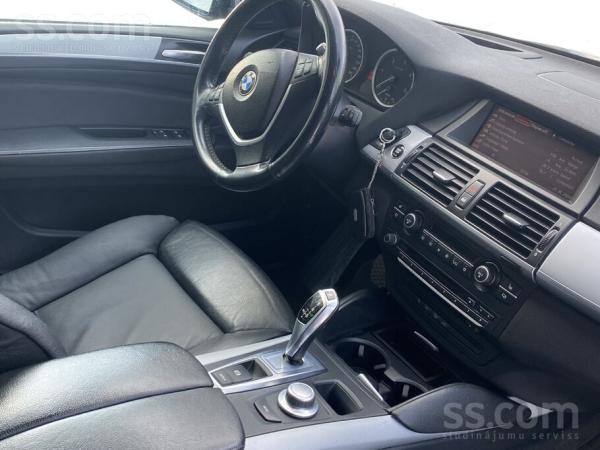 Black BMW X6 2009 in Riga, with an engine capacity of 3.00 L and mileage of 0 thousand km for 10900 €, photo 9 on AUTOMOTO.COM.LV