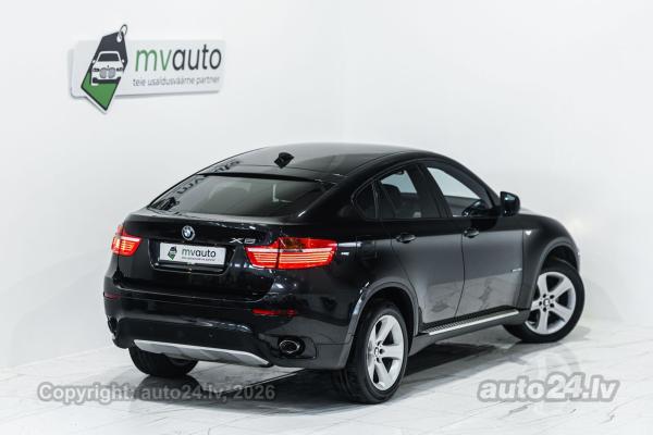 Black BMW X6 2009 in Tallinn, with an engine capacity of 3.00 L and mileage of 201 thousand km for 9990 €, photo 2 on AUTOMOTO.COM.LV