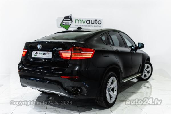 Black BMW X6 2009 in Tallinn, with an engine capacity of 3.00 L and mileage of 201 thousand km for 9990 €, photo 8 on AUTOMOTO.COM.LV
