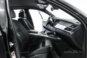 Melns BMW X6 2009 Tallina, ar dzinēja tilpumu 3.00 L un nobraukumu 201 tūkst. km par 9990 €, foto 16 vietnē AUTOMOTO.COM.LV